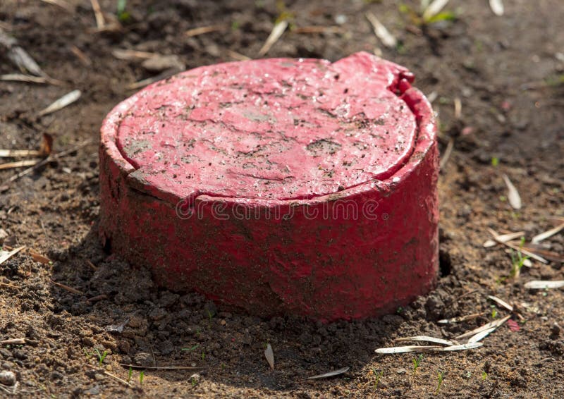 Red gas pipe in the ground stock image. Image of tube - 187090591