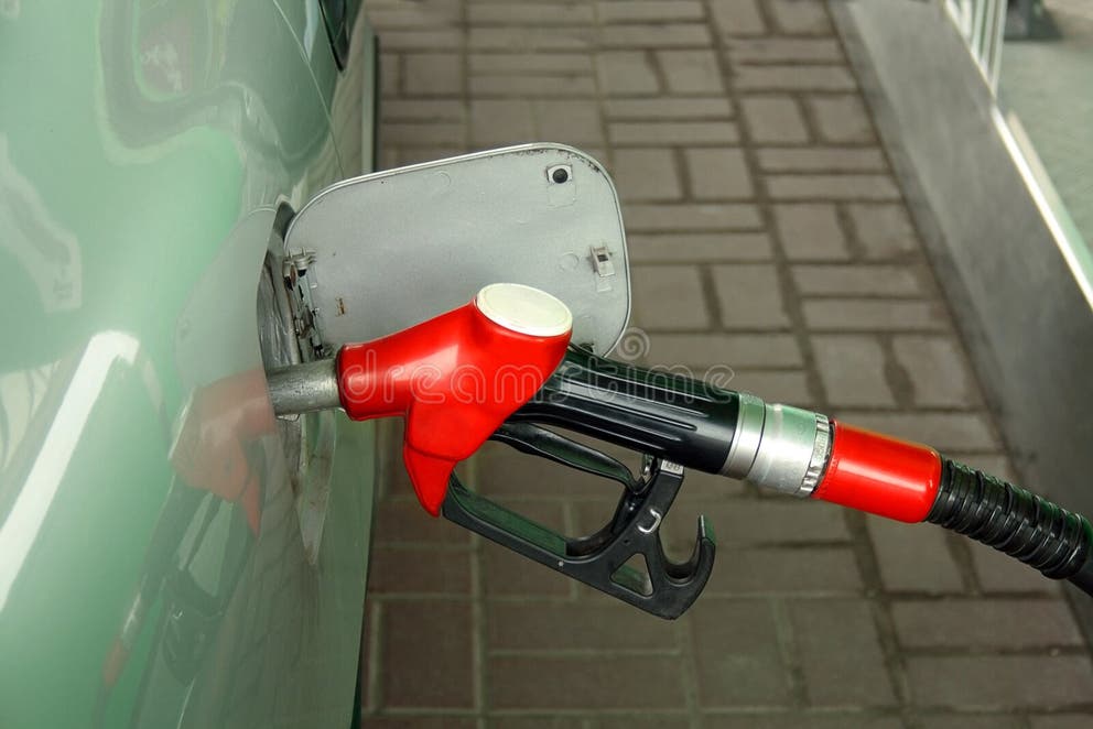 Red gas station nozzle stock image. Image of flammable - 20241933