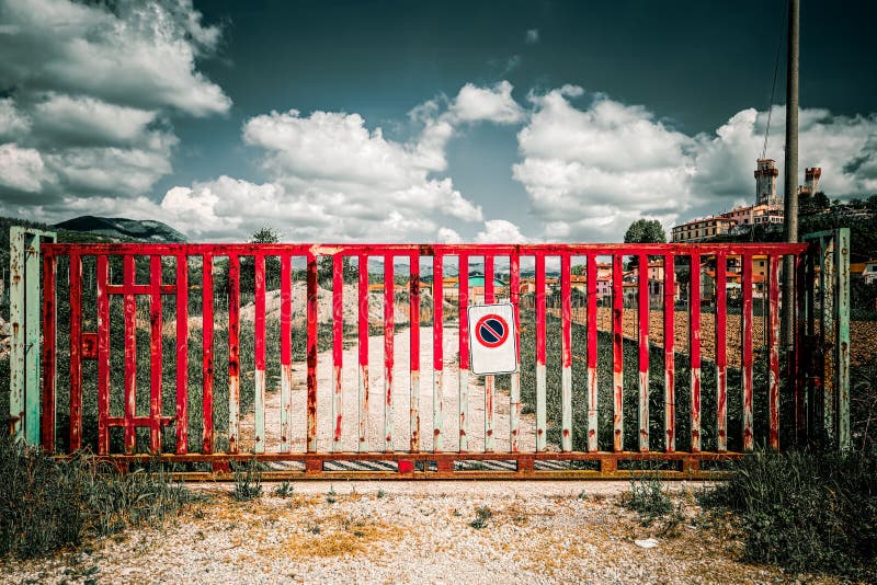 Red Gate Blocking Access To a Dirt Road in the Tuscan Countryside ...