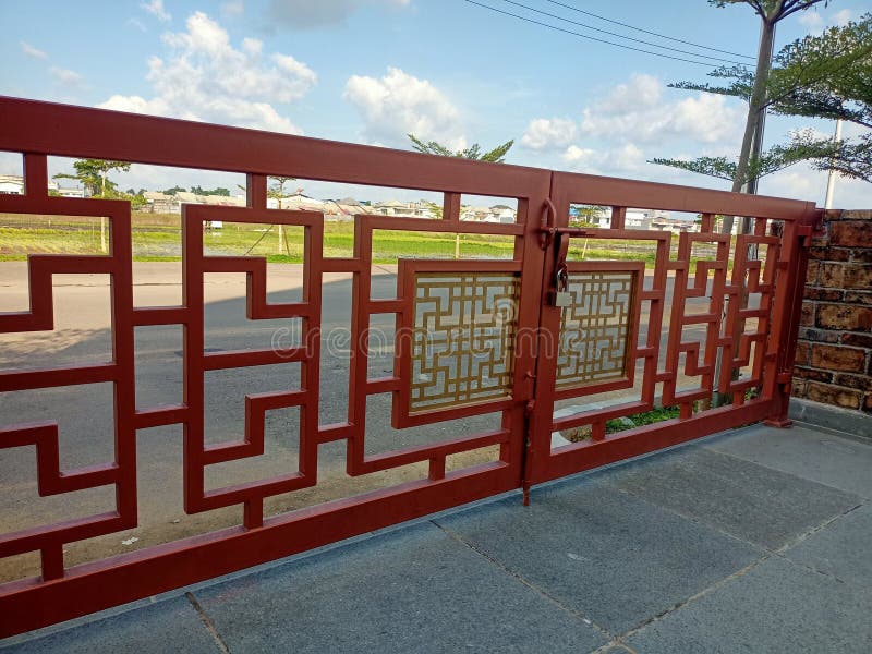 Red Gate Fence with House Front Motif Stock Image - Image of front ...