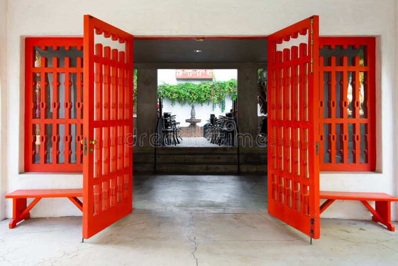 Red Gate Open To the Courtyard of a Wedding Reception Stock Photo ...