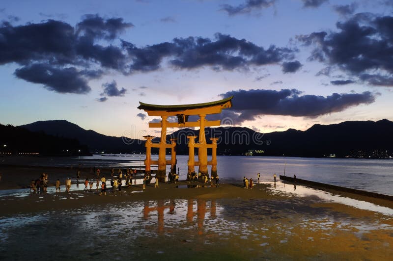 Red Gate of Shrine Itsukushima Stock Photo - Image of dramatic, clouds ...