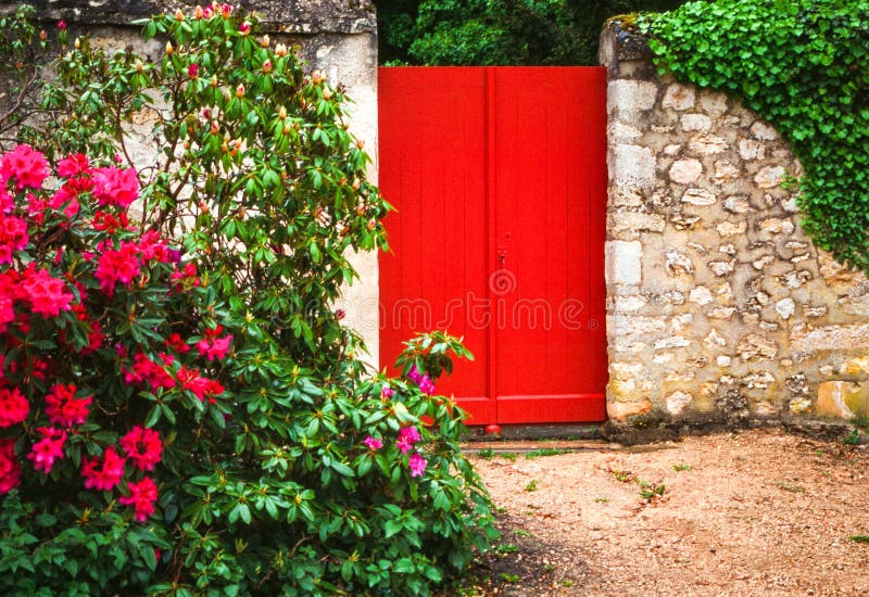 Red gate with stone wall stock photo. Image of stone - 71784598