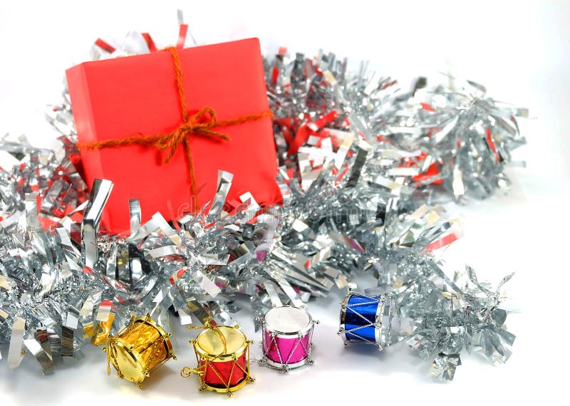 Red Gift Box with Colorful Mini Drums on White Background (Focus at ...