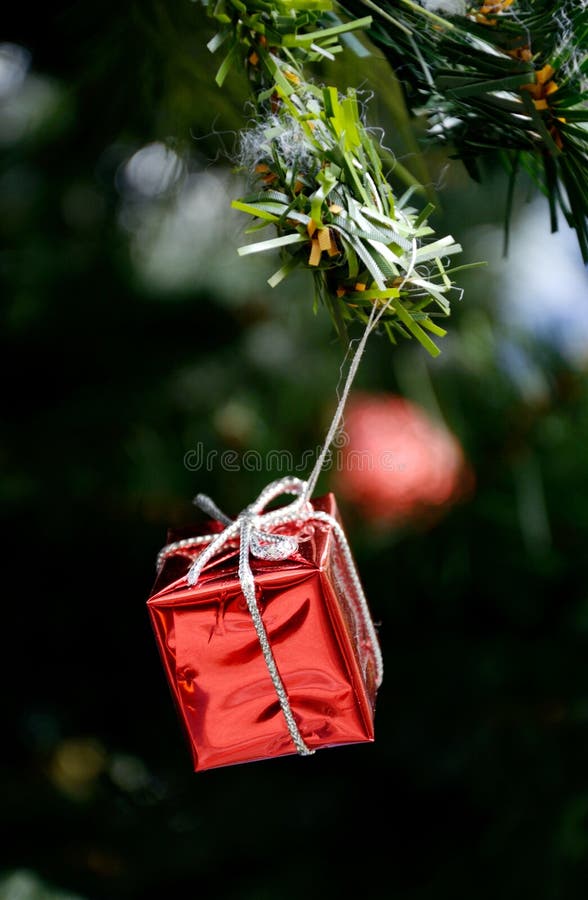 Red Gift Box Hanging on Christmas Tree Stock Image - Image of festive ...