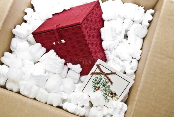 Red Gift Box in Packing Material Stock Photo - Image of fedex, noodles ...