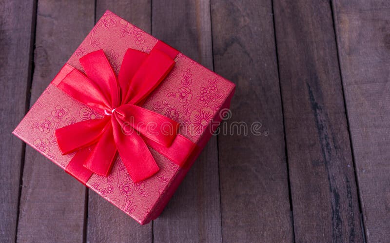 Red gift box with red bow stock photo. Image of grunge - 108399794