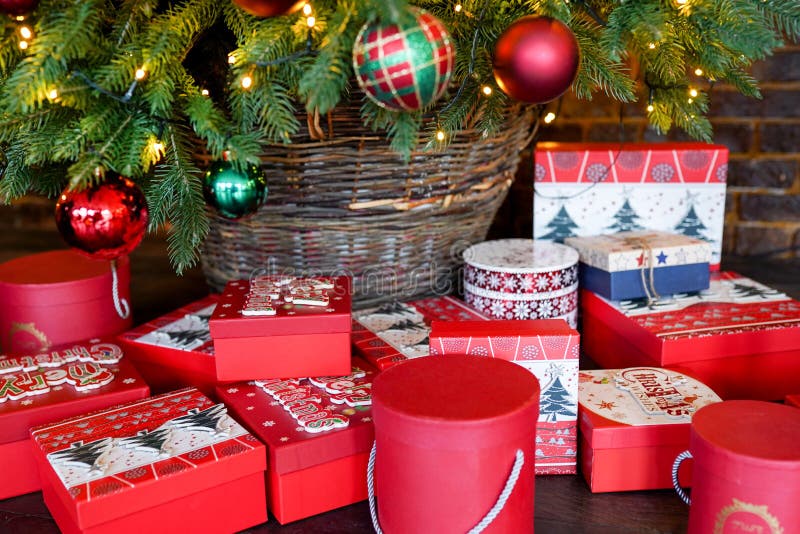Red Gift Boxes Under Christmas Tree. Luxury New Year Stock Image ...