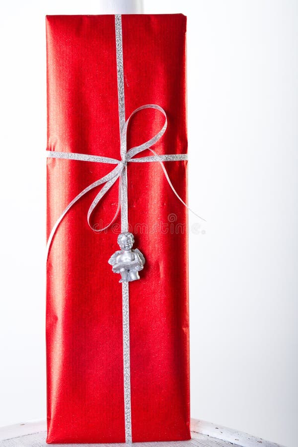 Red Gift with Silver Ribbon and Silver Angel Stock Image - Image of ...