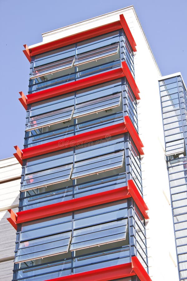 Red Glass Balconies in a Modern Building Stock Image - Image of ...