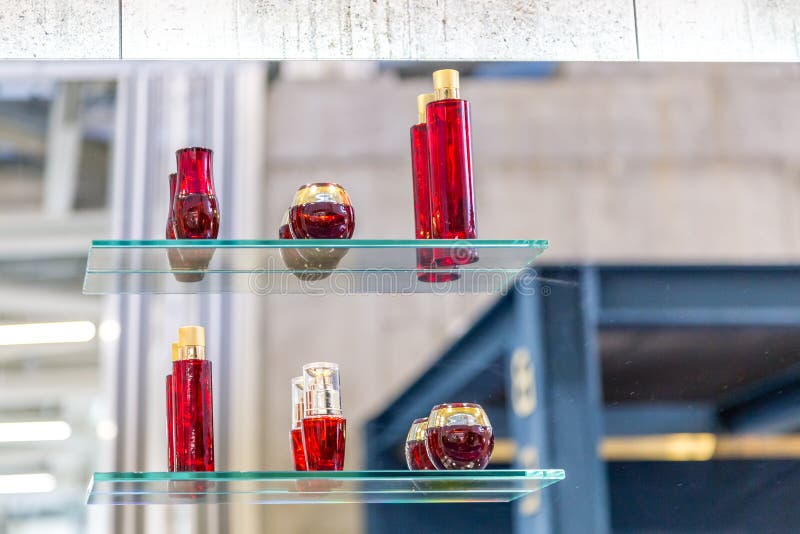 Red glass containers stock image. Image of shelves, glasses - 127741321