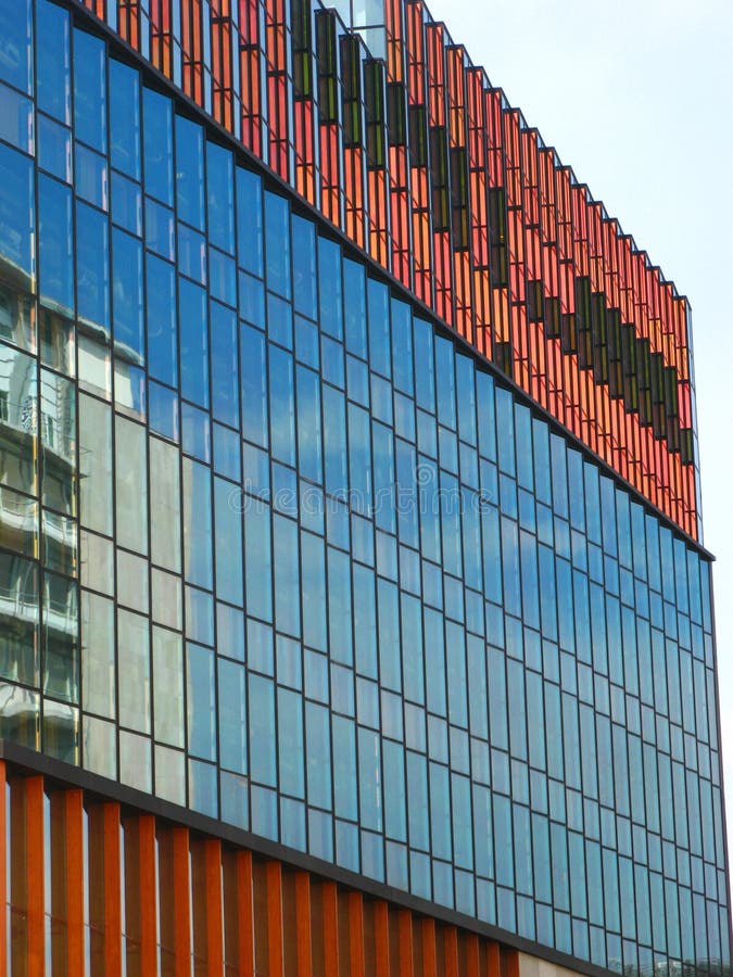 Red Glass Facade at Modern Building in Amsterdam Stock Image - Image of ...