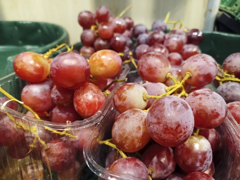 Red Globe Grapes on Plastic Boxes on a Market Stand Stock Image - Image ...