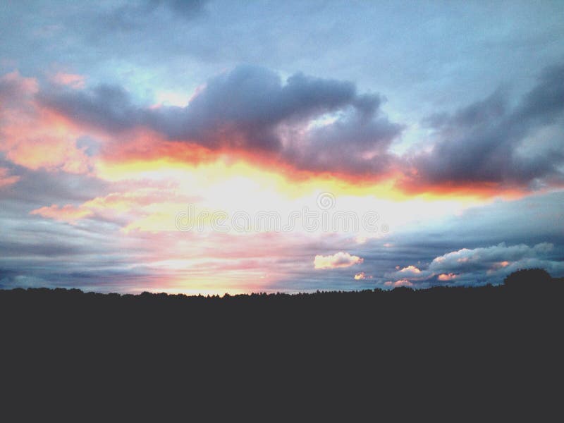 Red glow from sun stock image. Image of evening, sunset - 44781145