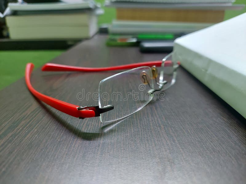 Red goggles on study table stock image. Image of study - 270596021