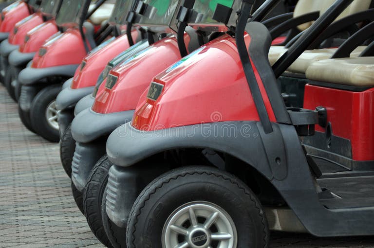 Red Golf Carts stock photo. Image of lineup, game, wheel - 16866844