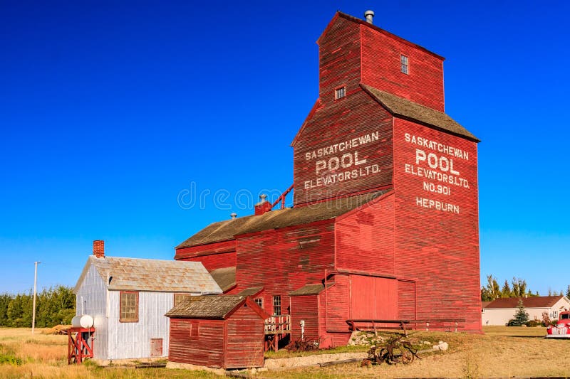 A Red Grain Silo with a White Sign that Says Pool Stock Photo - Image ...