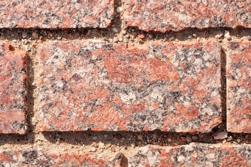 Red Granite Brick in Masonry Closeup Stock Photo - Image of grain ...