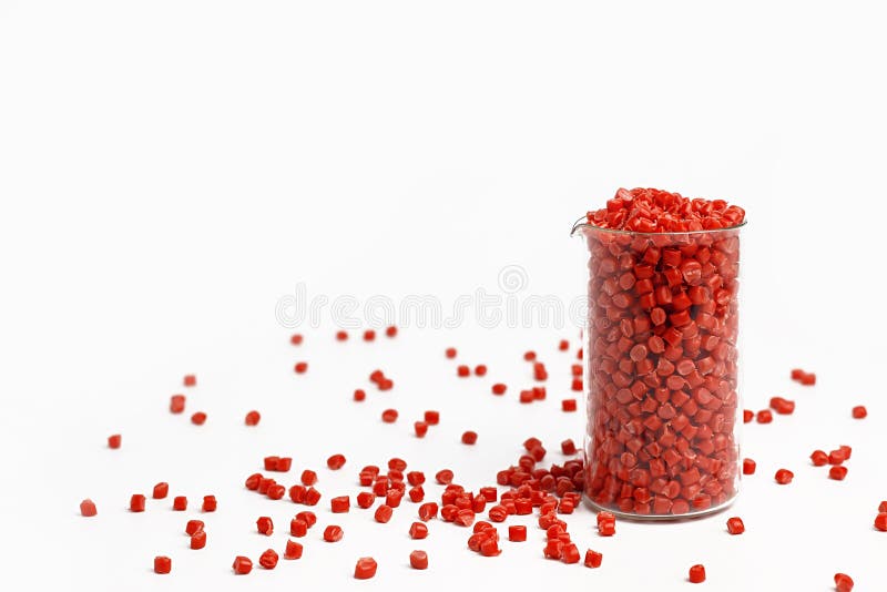 Red Granules of Polypropylene, Polyamide in a Measuring Beaker and a ...