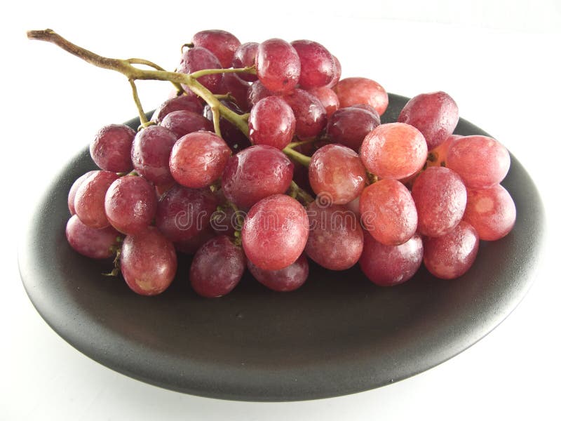 Red grapes stock image. Image of cluster, black, white - 4695857