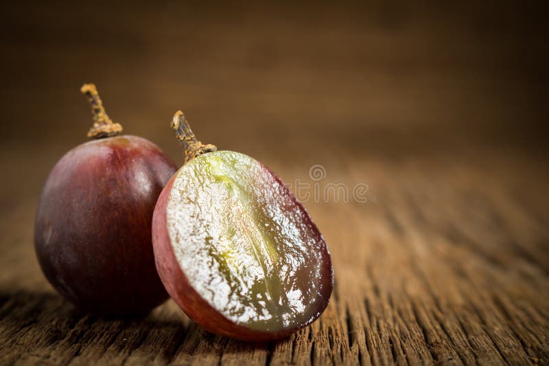 Red grapes. slice. half stock image. Image of fruit - 114803665