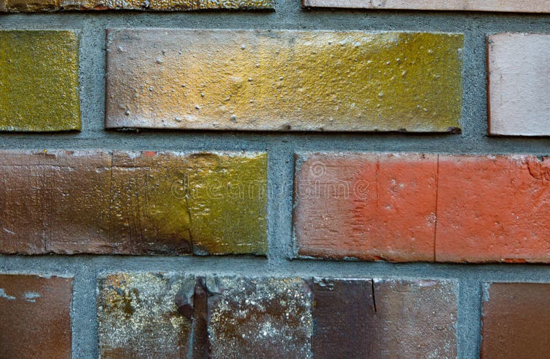 Red Glazed Brick Background. Bricks of Different Shades Close-up Stock ...