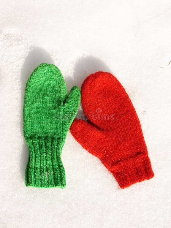 Red and Green Mittens on Snow. Stock Image - Image of wool, knit: 12628473