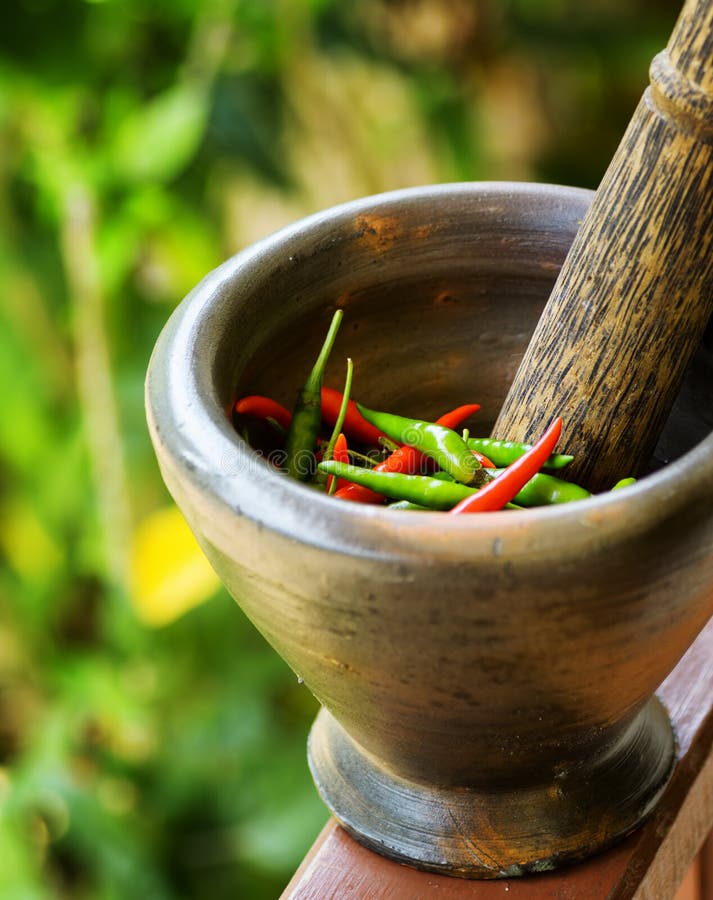 Red and Green Pepper in a Stone Mortar Stock Image - Image of heat ...
