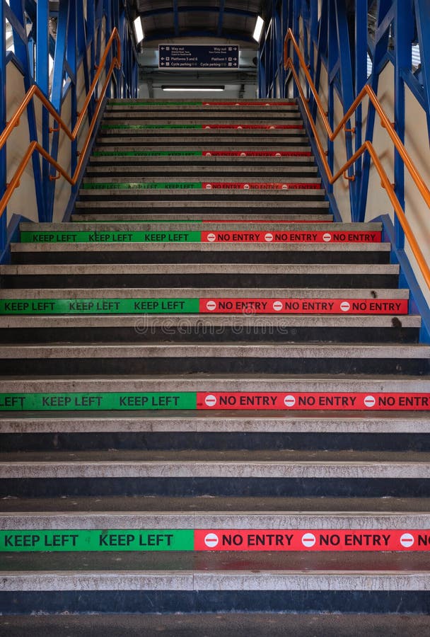Steps from Train Platform, with Signs To Keep Left. Stock Photo - Image ...