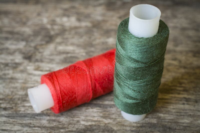 Red and green thread stock image. Image of hole, brown - 124356035