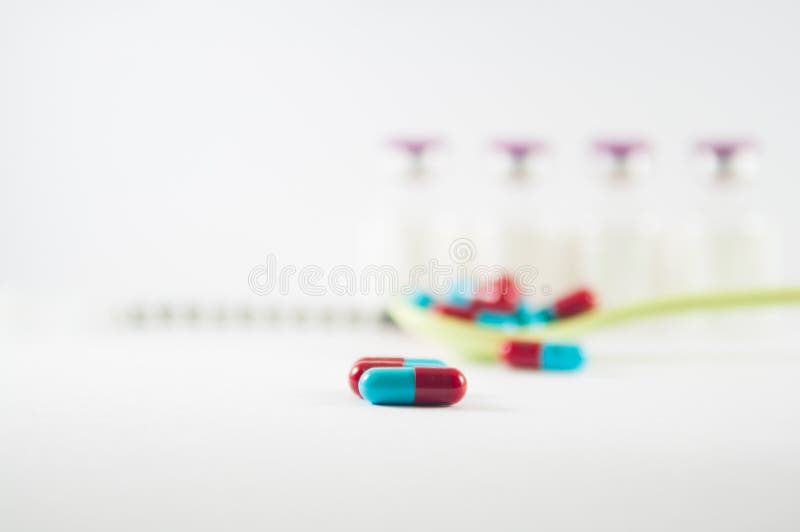 Red and Grey Capsule on Countertop Tray Stock Photo - Image of ...