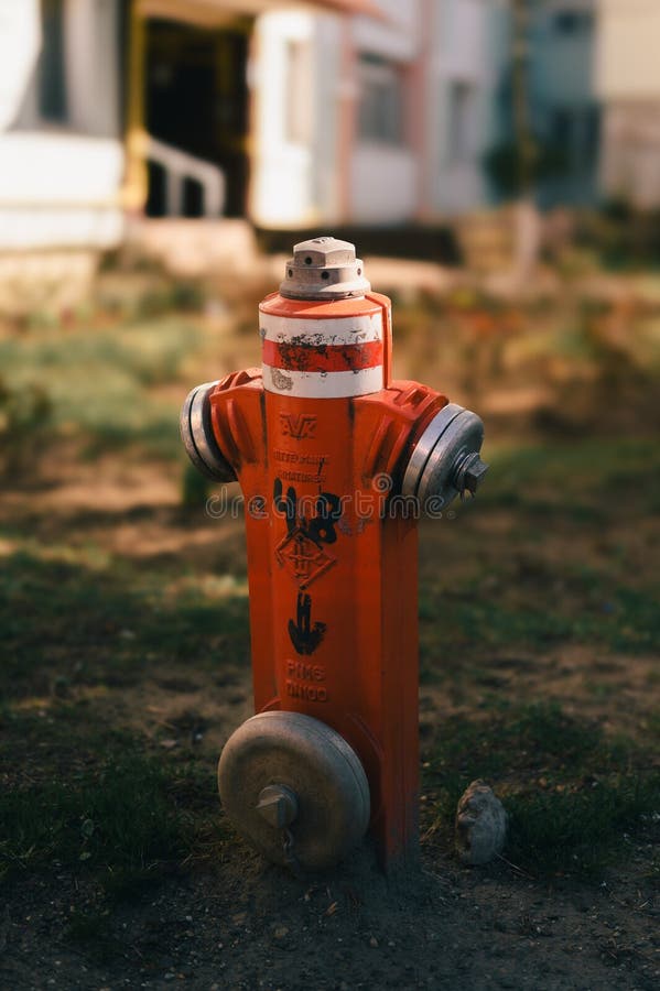 The Fire Hydrant is Red and Grey in Color, Stock Photo - Image of ...