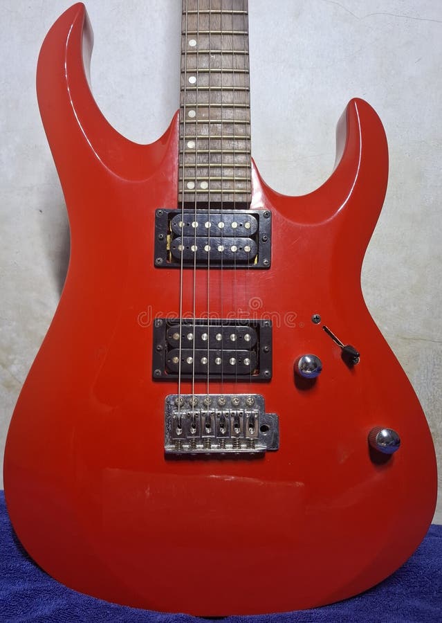 Red Guitar Blue Base and Black Coil Stock Photo - Image of blue, base ...