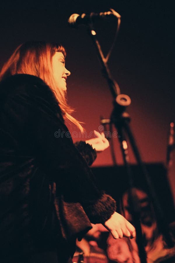 Red-haired Attractive Hispanic Singer on Stage. Stock Image - Image of ...