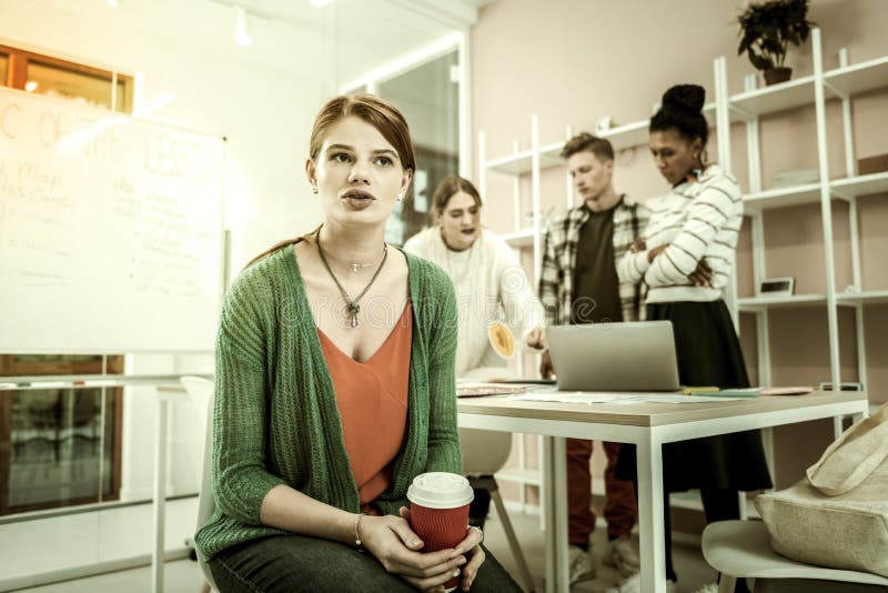 Red-haired Female Student Feeling Like Outcast in Her Study Group Stock ...
