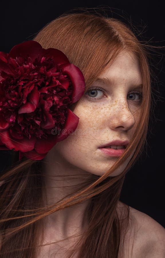 Red-haired Girl with Red Flower Stock Image - Image of face, culture ...
