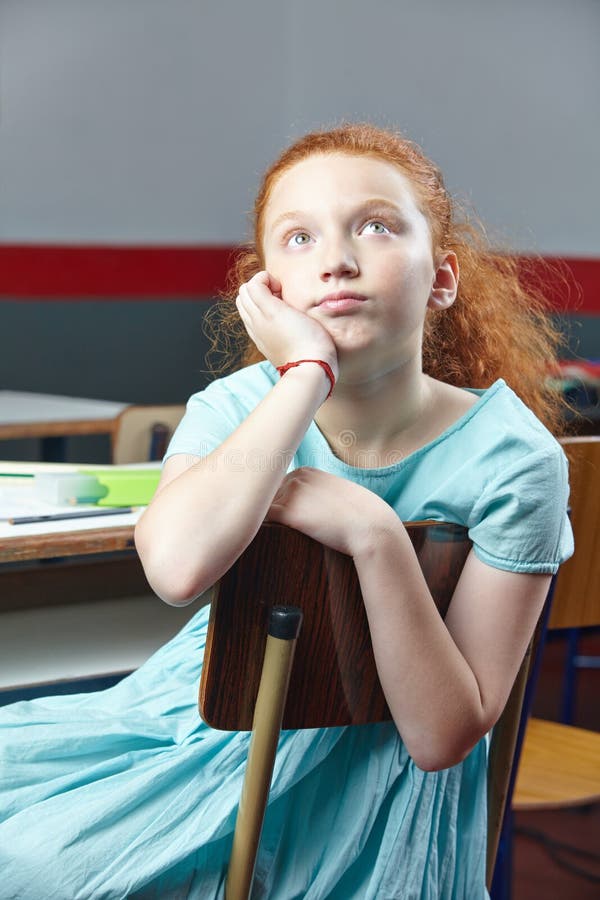 Red-haired Girl Thinking in School Stock Image - Image of young ...