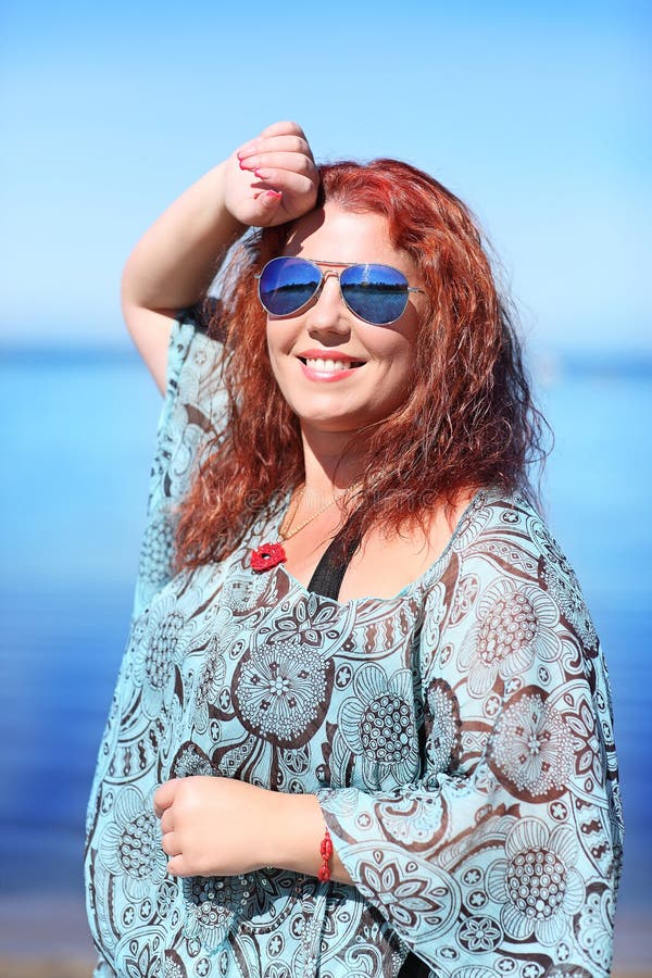 The Red Haired Plus Size Woman in Evening Long Dress and Leather ...