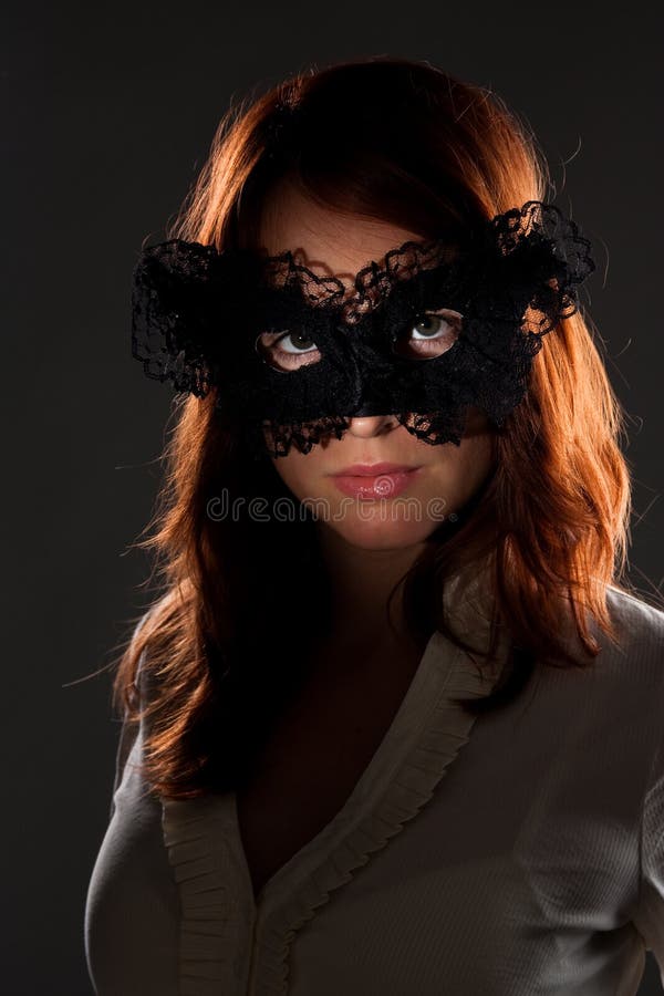 Red-haired Woman in a Black Mask Stock Image - Image of girl, caucasian ...