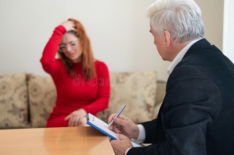 A Red-haired Woman Talks about Her Problems in a Session with a ...
