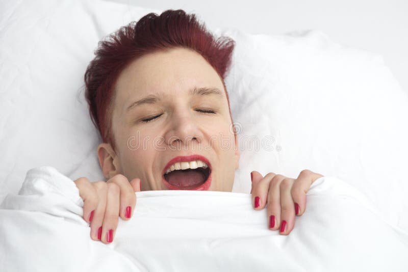 Red-haired Woman Yawning in Bed Stock Image - Image of napping, haired ...