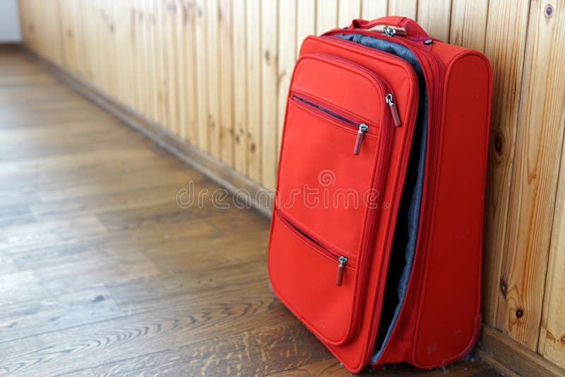 Red Half-open New Suitcase on the Wooden Background Stock Photo - Image ...