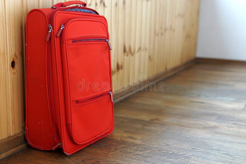 Red Half-open New Suitcase on the Wooden Background Stock Image - Image ...