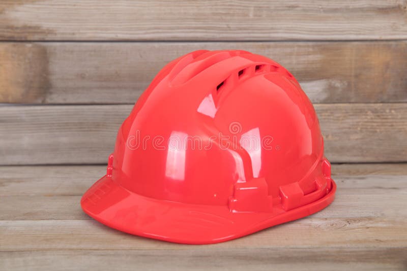 A Red Hard Hat for the Construction Industry Stock Image - Image of ...