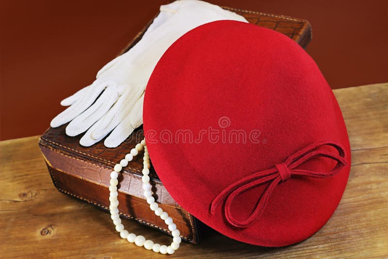 Red hat on leather case stock image. Image of style, fashion - 51796545
