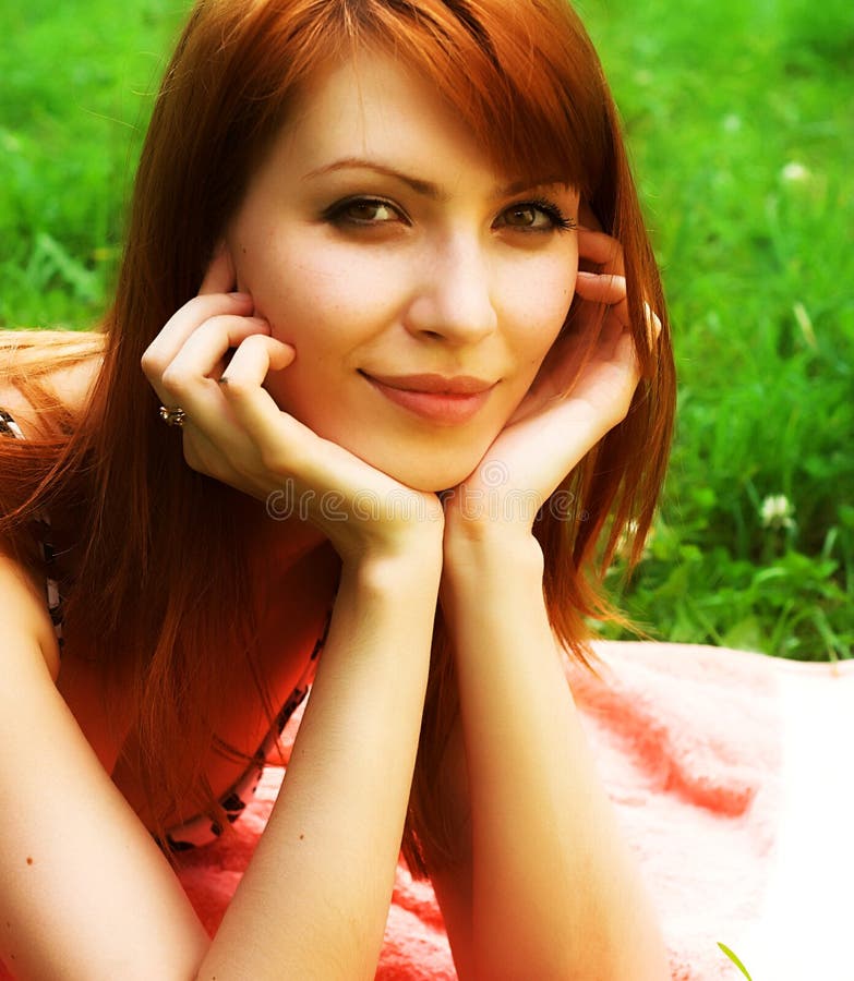 Red-headed Girl on the Grass Stock Photo - Image of lifestyle ...
