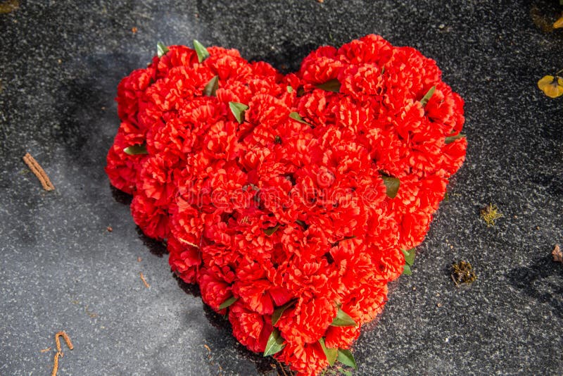 Red heart of flowers stock photo. Image of graveyard - 191655264