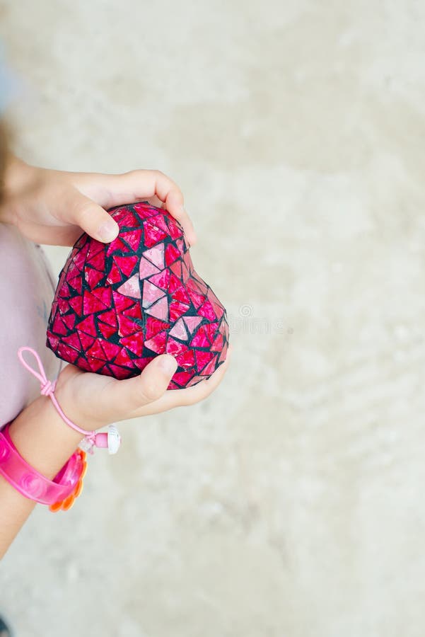 Red Heart in the Hands of a Child. View from Above Stock Photo - Image ...