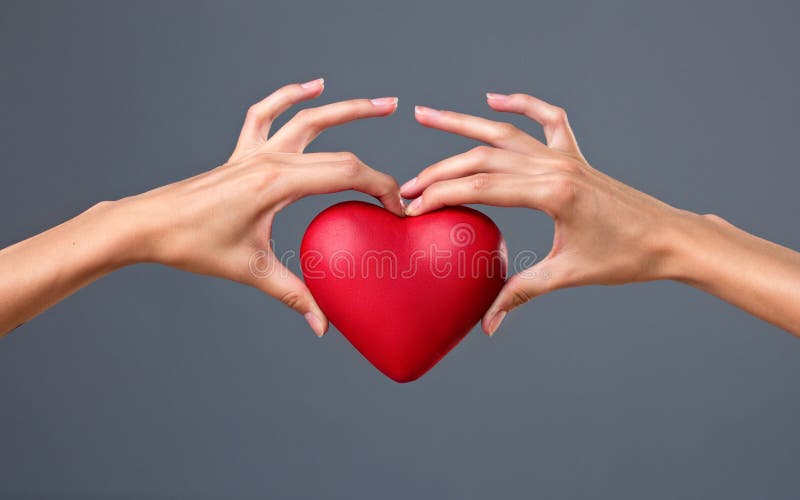 Two Hands Reach for the Heart Symbol. Stock Photo - Image of care ...