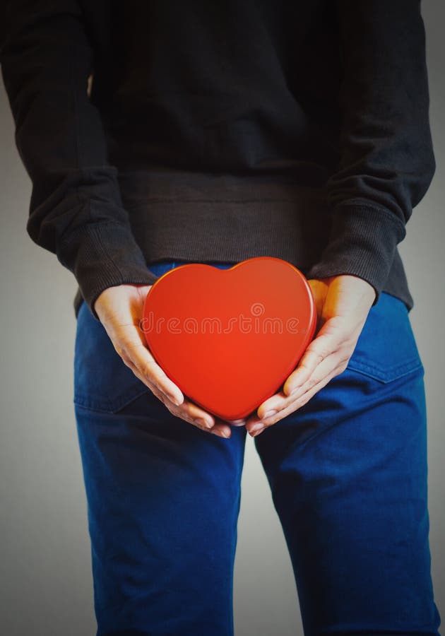 Red Heart Holding by Hands in the Back Stock Image - Image of holiday ...